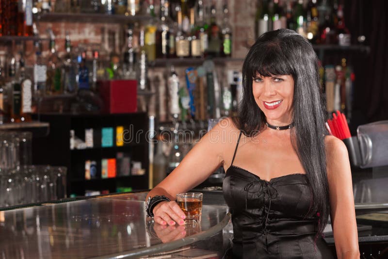 Pretty Smiling Woman at Bar Counter Stock Photo - Image of alcohol ...