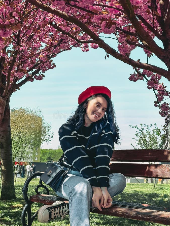 Pretty Smiling Woman Posing in Front of Blooming Sakura Trees Stock ...