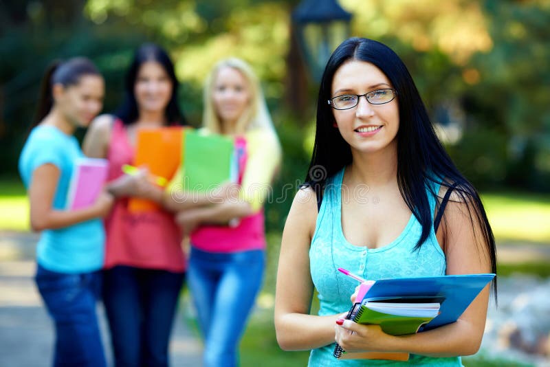 Pretty Student with Group of People on Background Stock Photo - Image ...