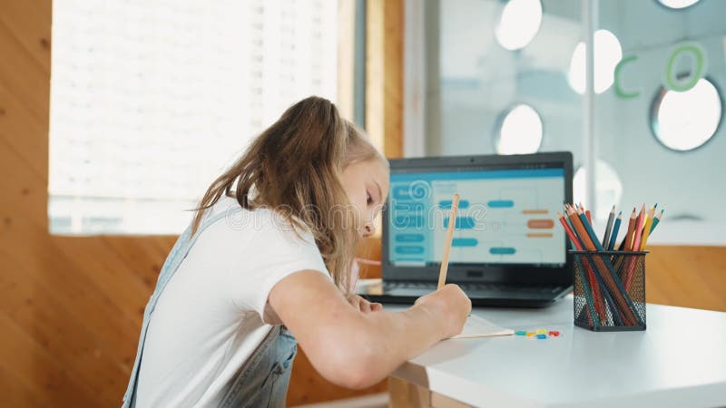 Pretty Student Thinking or Doing Homework while Looking at Laptop ...