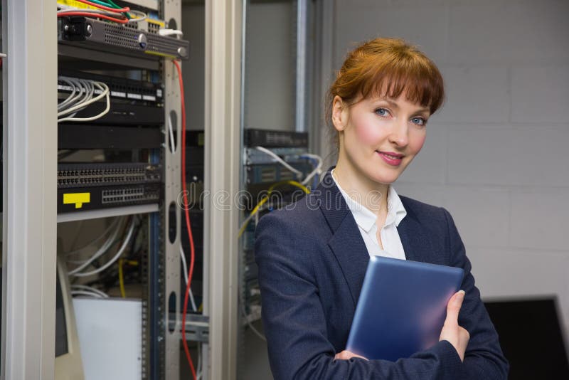 Pretty Technician Smiling at Camera beside Open Server Stock Image ...