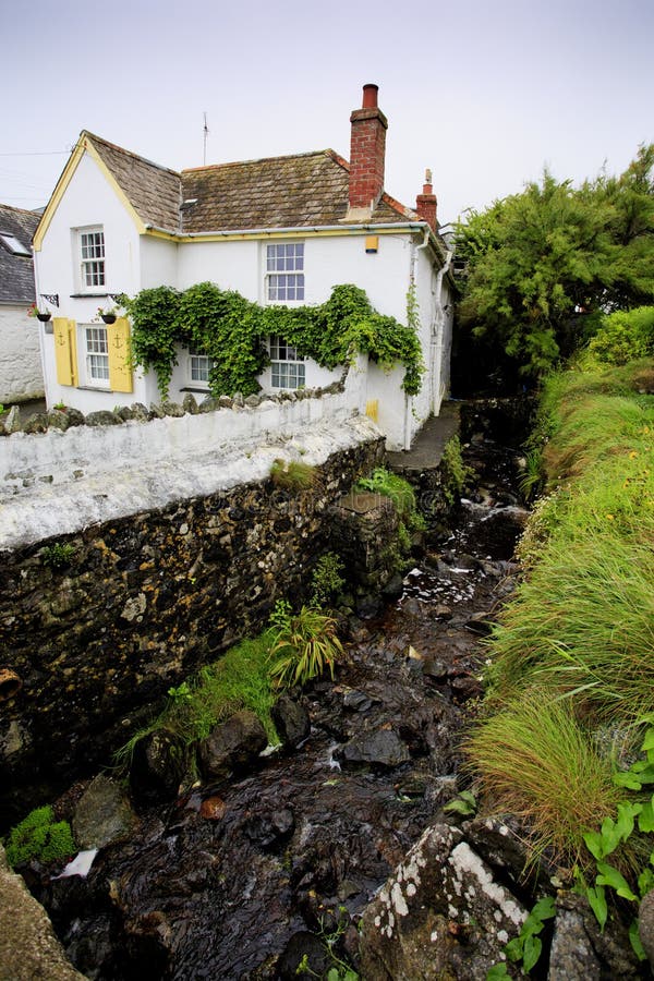 Pretty Traditional House by a Stream Stock Photo - Image of river ...