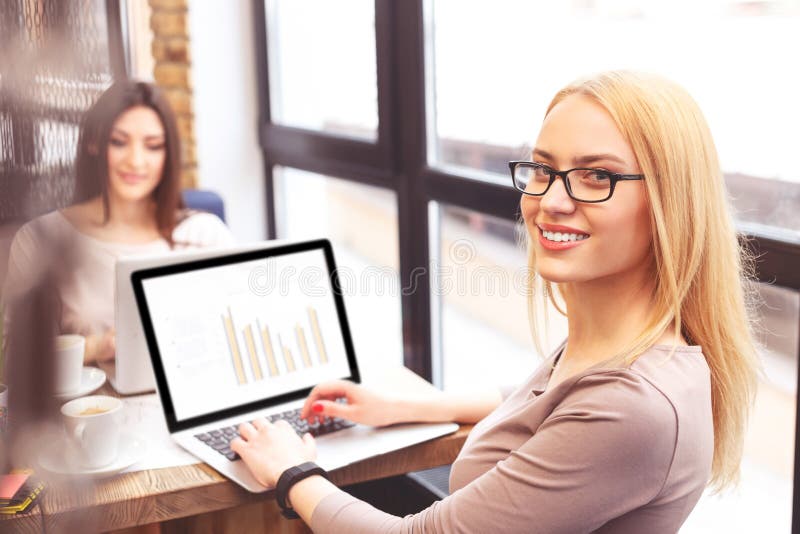 Pretty Two Women Using Computers for Work Stock Photo - Image of ...