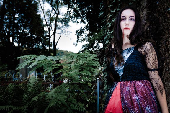 Pretty vampire near tree stock photo. Image of long, fantasy - 45216300