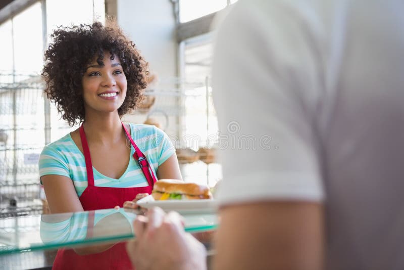Pretty Waitress Giving Sandwich To Customer Stock Image - Image of ...