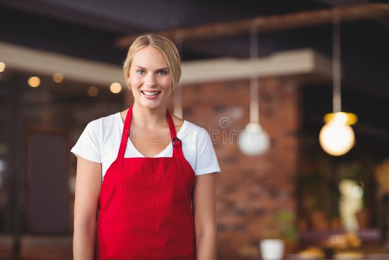 Pretty Waitress Looking at the Camera Stock Photo - Image of attractive ...