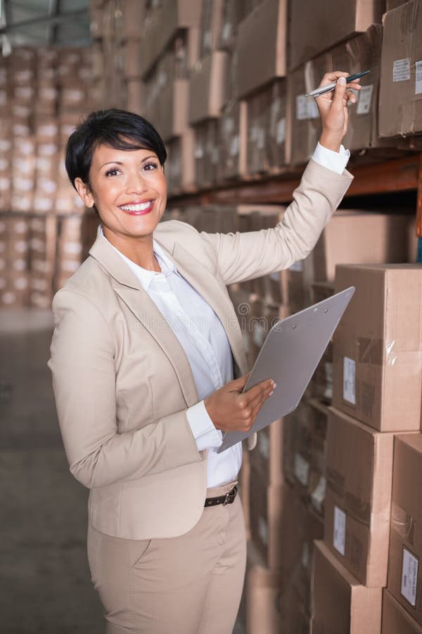 Pretty Warehouse Manager Checking Inventory Stock Image - Image of ...