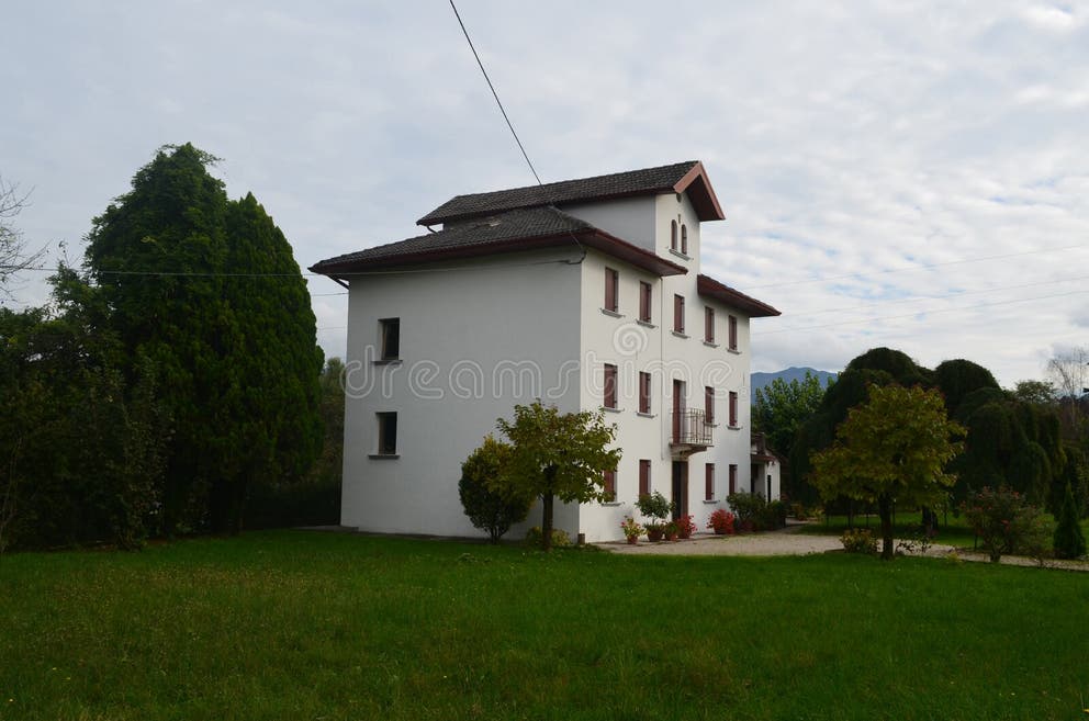 Pretty White House with Red Windows in Dolomites Stock Image - Image of ...
