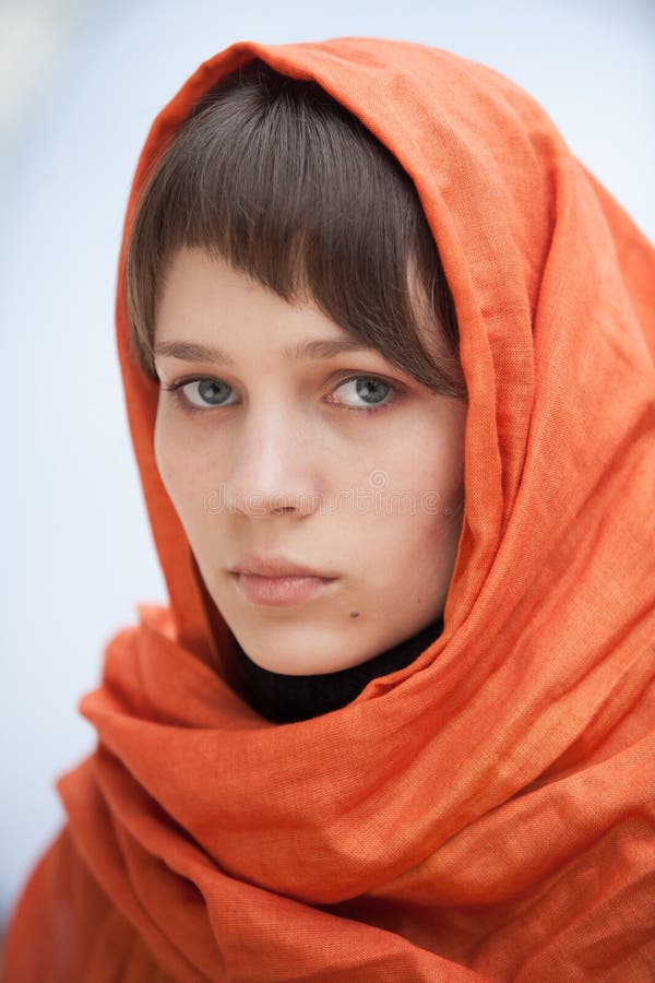 Pretty Woman With Blue Eyes Woman Wearing A Head Scarf Stock Image