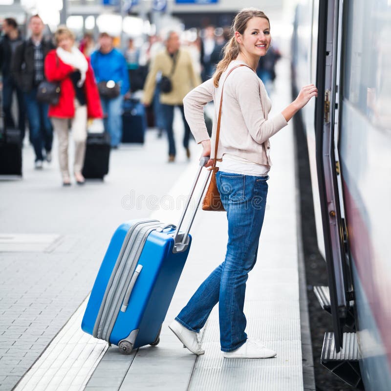 Pretty Woman Boarding a Train Stock Photo - Image of beautiful, arrival ...