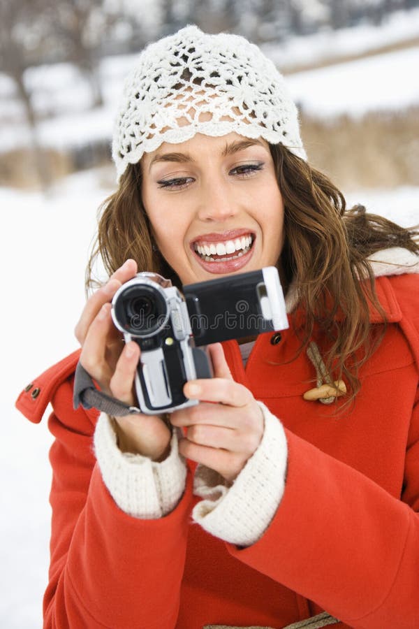 Woman with video camera. stock image. Image of knit, climate - 3182573