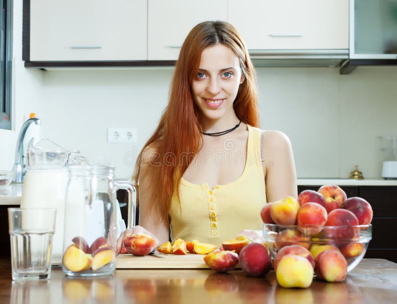 Pretty Woman Cooking Beverages with Peaches Stock Image - Image of cook ...