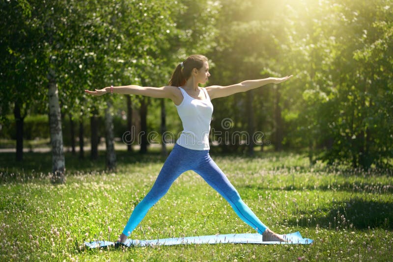 Pretty Woman Doing Yoga Exercises Stock Image - Image of exercise ...