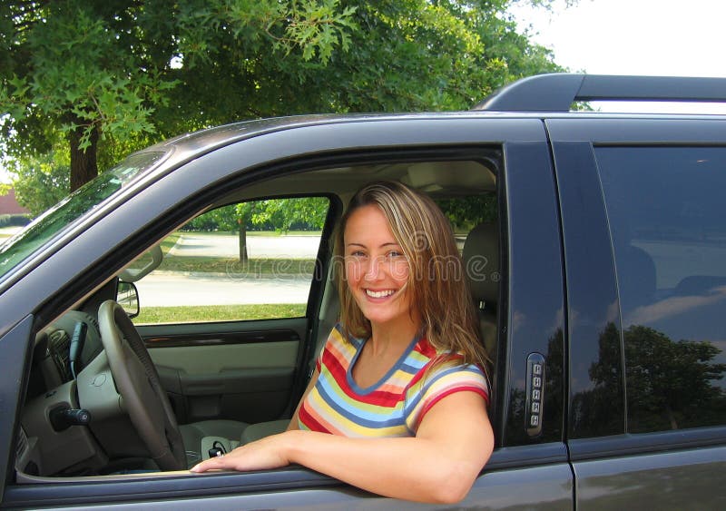 Pretty Woman Driver stock photo. Image of woman, smile - 1014010