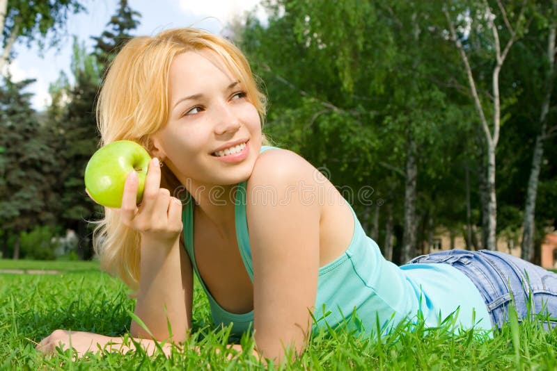 Pretty woman eating stock photo. Image of fresh, lifestyle - 6952028