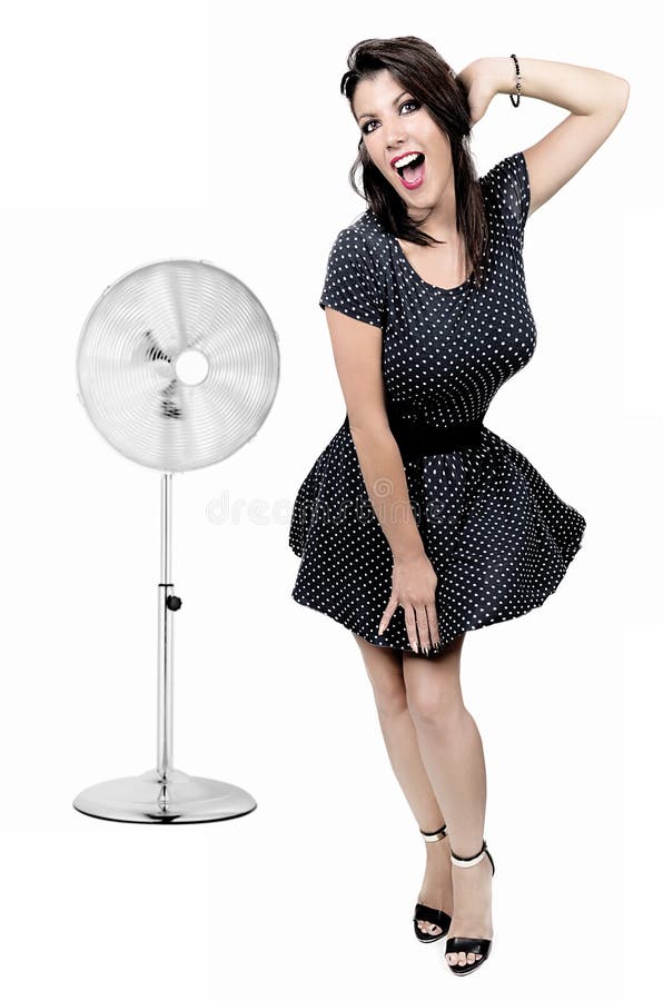 Pretty Woman Enjoying Fan Blowing Behind Stock Image - Image of happy ...
