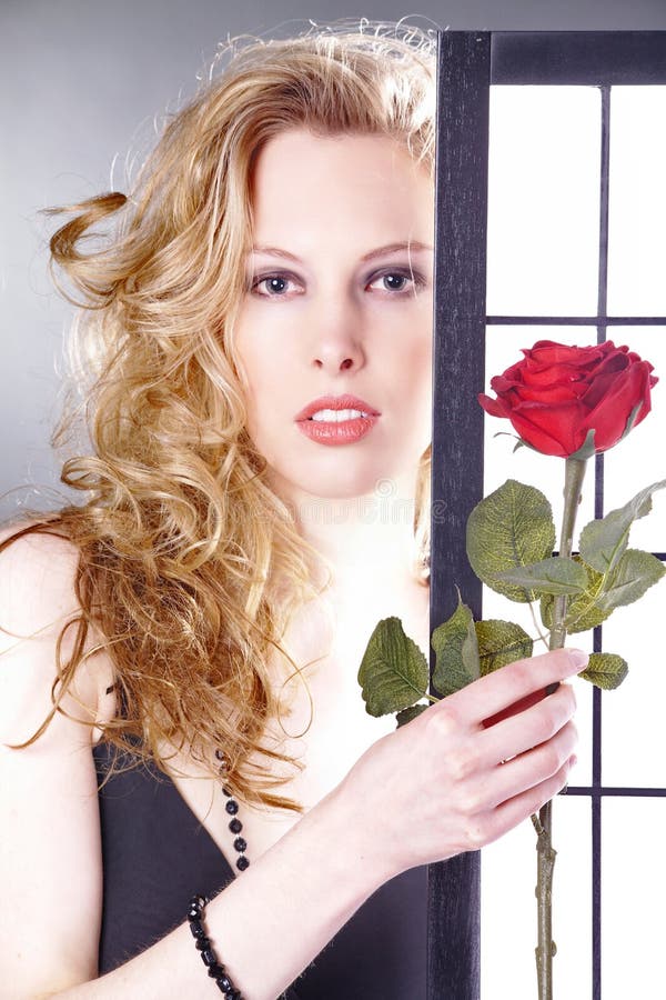 Pretty woman with flowers stock photo. Image of figure - 39253972