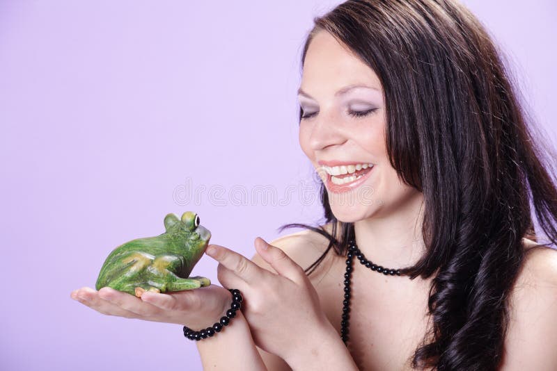 Pretty woman with frog stock photo. Image of dress, legs - 39255970