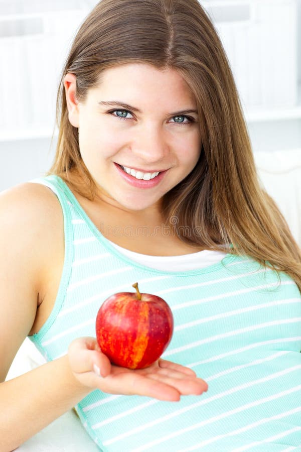 111 Pretty Woman Holding Apple Sitting Sofa Stock Photos - Free ...