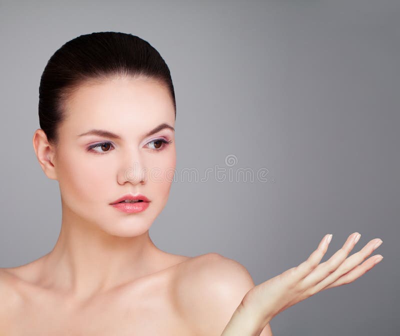 Woman with Clean Skin Touching Her Hand Her Face. Spa Beauty Stock ...