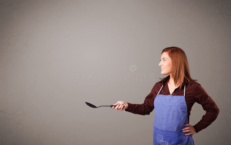 Pretty Woman Holding a Spoon Stock Image - Image of caucasian, cooking ...
