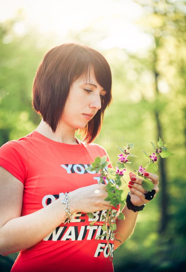 Pretty Woman Holding Spring Flowers Stock Image - Image of park, forest ...