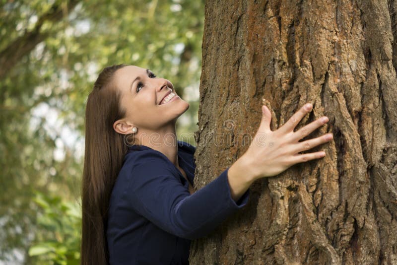Pretty Woman Hugging a Tree Stock Photo - Image of pretty, trunk: 44615874