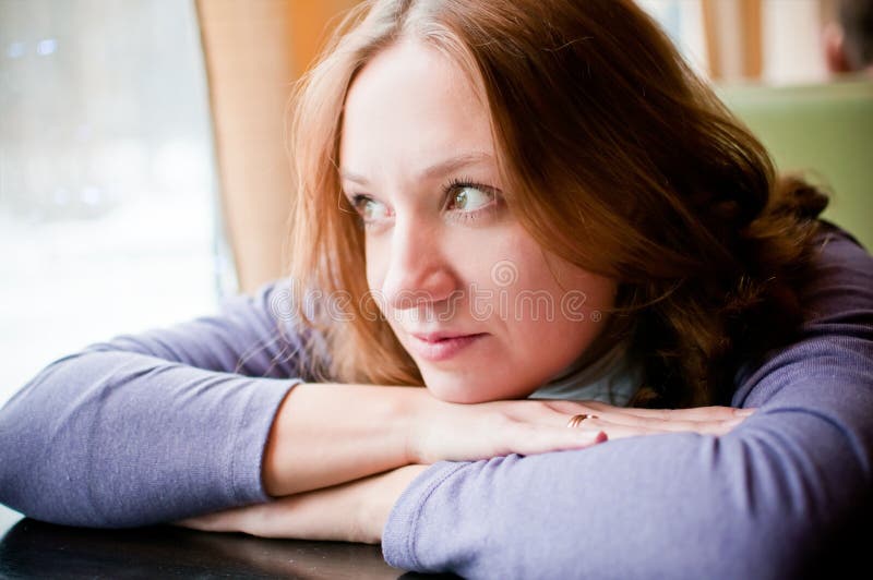 Portrait Of A Pretty Young Woman Leaning On A Table Stock Photo - Image ...