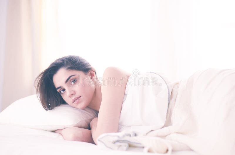 Pretty Woman Lying Down on Her Bed at Home Stock Image - Image of adult ...