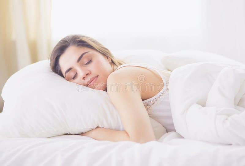 Pretty Woman Lying Down on Her Bed at Home Stock Photo - Image of ...