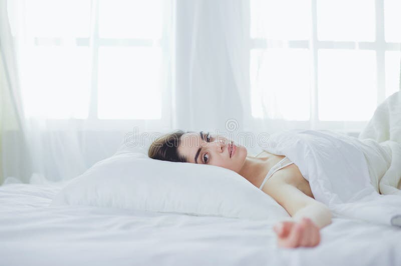 Pretty Woman Lying Down on Her Bed at Home Stock Image - Image of girl ...