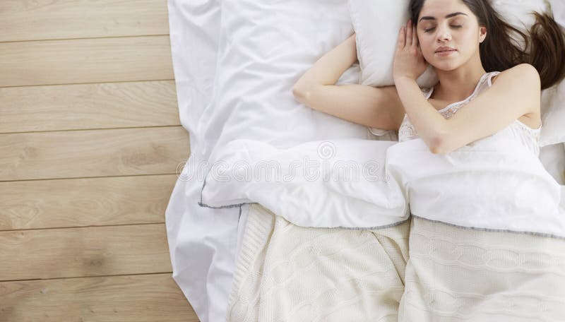 Pretty Woman Lying Down on Her Bed at Home Stock Photo - Image of ...