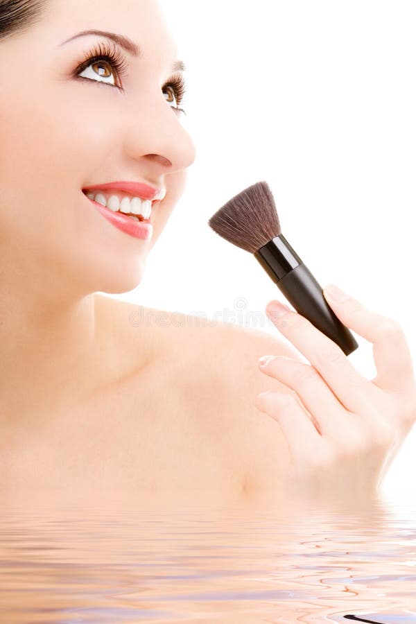 Pretty Woman with a Make-up Brush Stock Photo - Image of health, girl ...