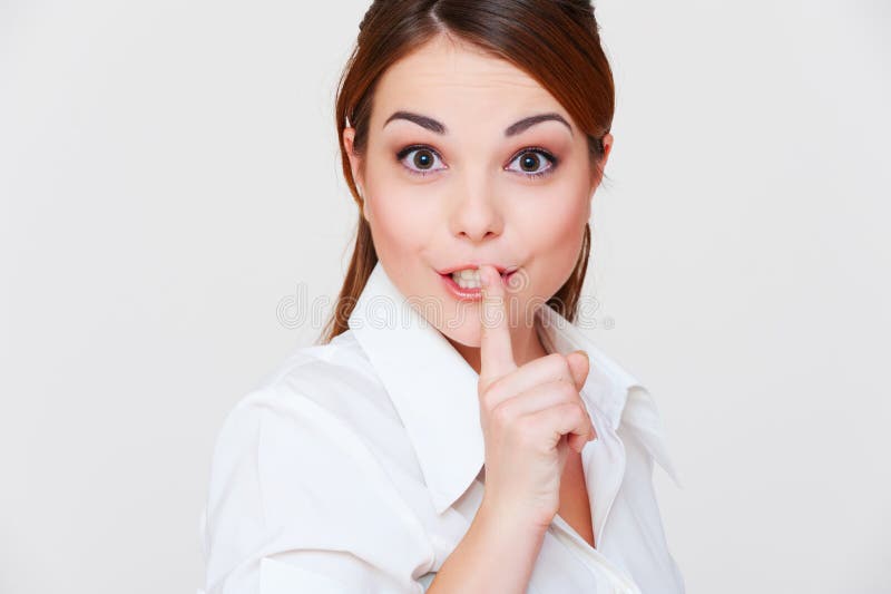Woman making silence sign stock photo. Image of forefinger - 15606122