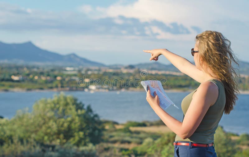 Pretty woman with map stock image. Image of lifestyle - 37534379