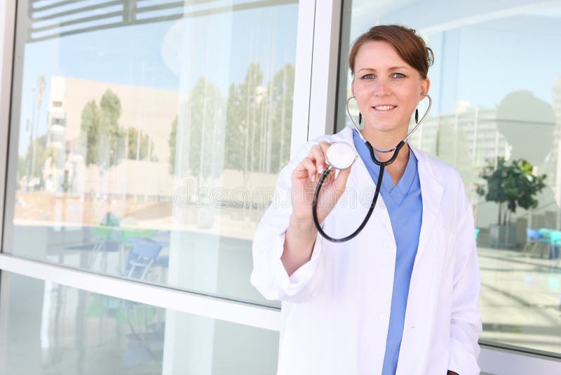 Pretty Woman Nurse at Hospital Stock Photo - Image of medical, hair ...