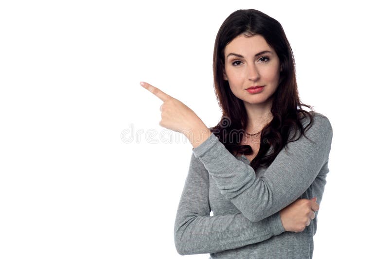 Pretty Woman Pointing Towards Something Stock Photo - Image of looking ...