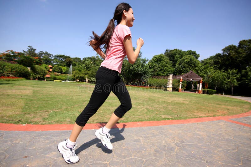 Pretty Woman Running Outdoors Stock Photo - Image of park, outdoor ...