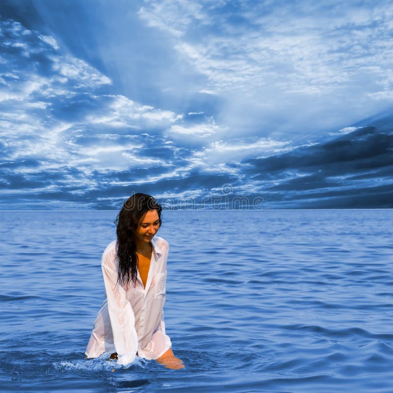 Pretty woman on the sea stock image. Image of climate - 7837881