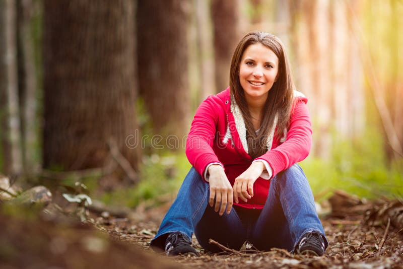 Pretty Woman Sitting stock image. Image of beauty, forest - 75984749