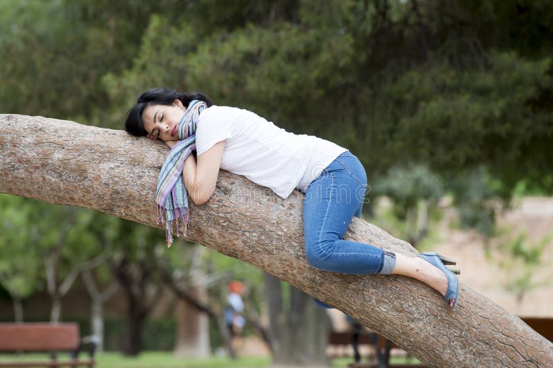 Pretty Woman Sleeping in a Tree after Being Over Worked and Having ...