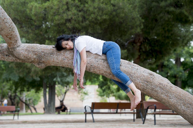 Pretty Woman Sleeping in a Tree after Being Over Worked and Having ...
