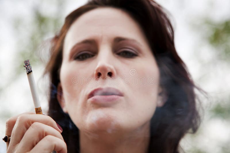 Pretty Woman Smoking stock photo. Image of smoker, smoke - 10114314