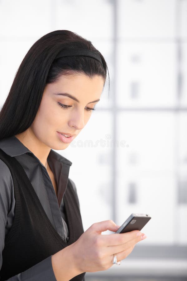 Pretty woman texting stock photo. Image of businesswoman - 21534946
