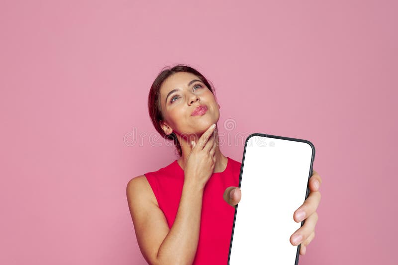 Pretty Woman Thinking and Holding Smartphone with Empty White Screen ...