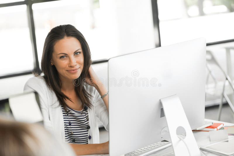 Pretty Woman Using Computer Stock Image - Image of desk, colleague ...