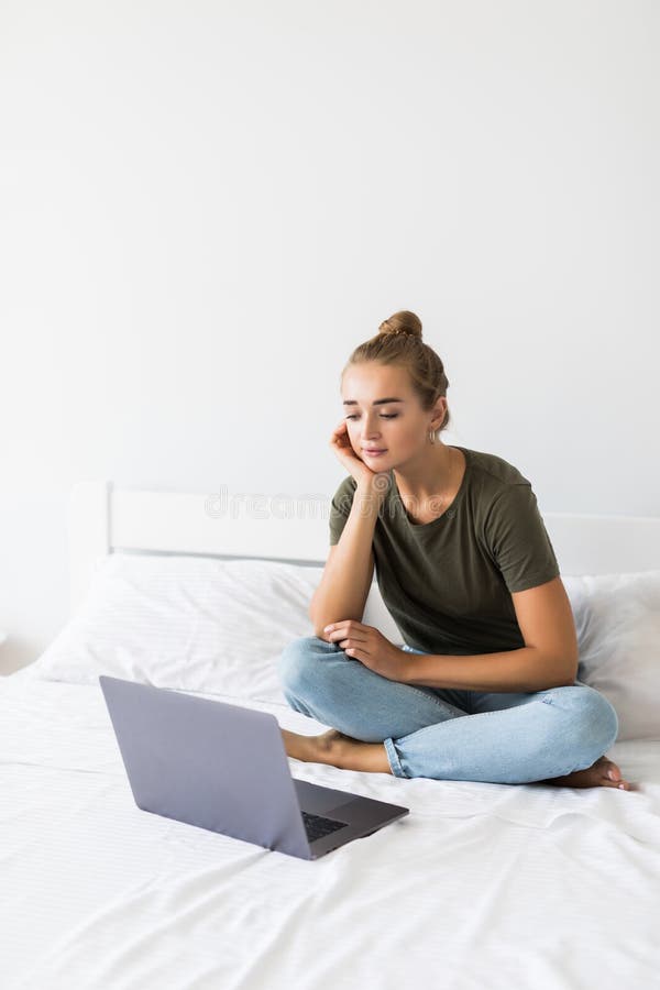 Pretty Young Woman Using Her Laptop in Bed Stock Image - Image of ...