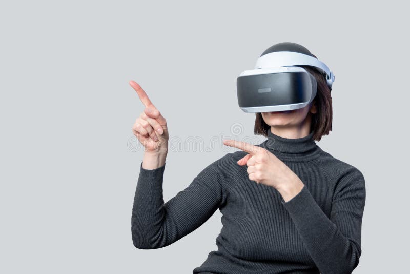 Pretty Woman Using Vr Headset Pointing with Her Hands at Something on ...