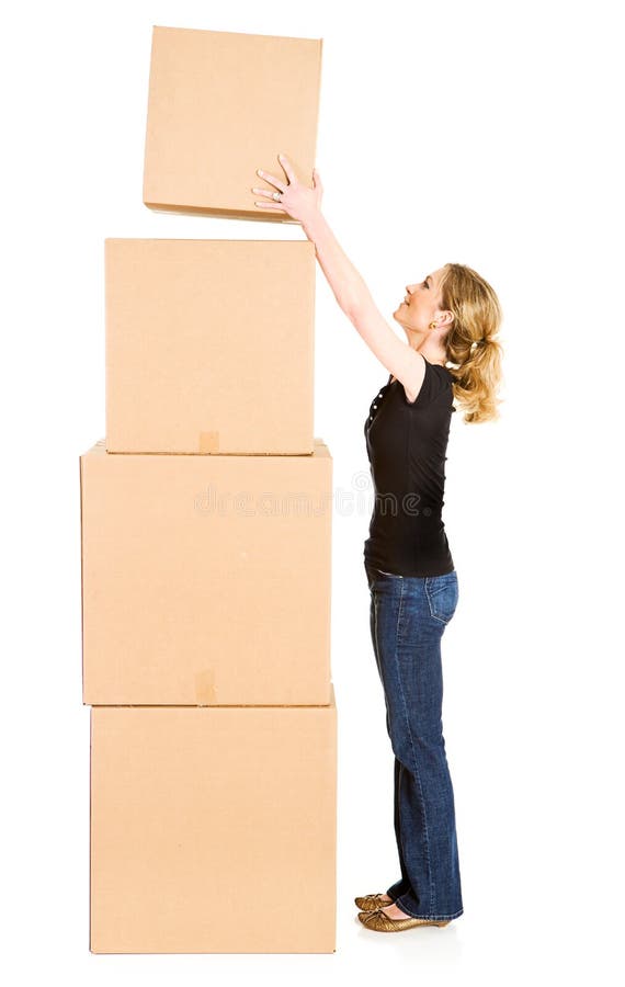 Boxes: Side View of Woman Adding Box To Stack Stock Photo - Image of ...