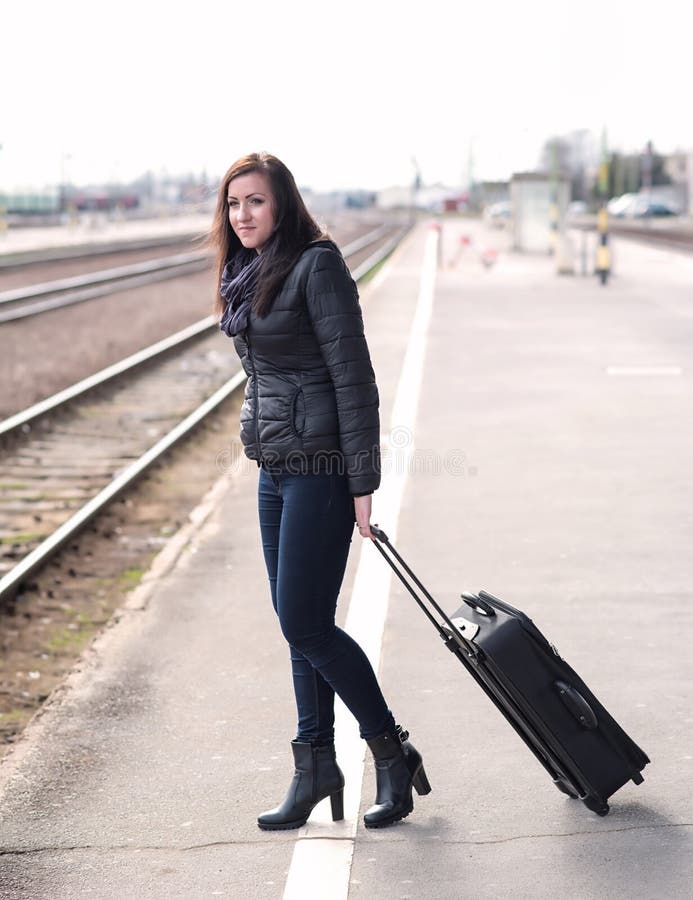 Pretty Woman Waiting for a Train Stock Photo - Image of attractive ...